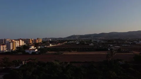 Aerial view of a sunset. On the left is ... | Stock Video | Pond5