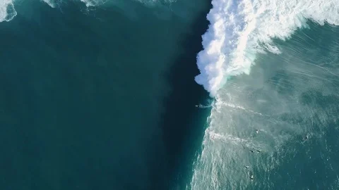 Aerial view of surfer and wave in ocean.... | Stock Video | Pond5