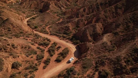 Aerial view of SUV car driving off-road ... | Stock Video | Pond5
