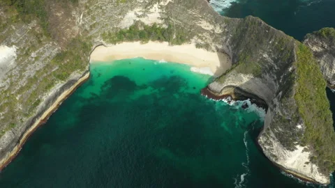 Aerial view of a T-Rex shaped cliffs. Ke... | Stock Video | Pond5