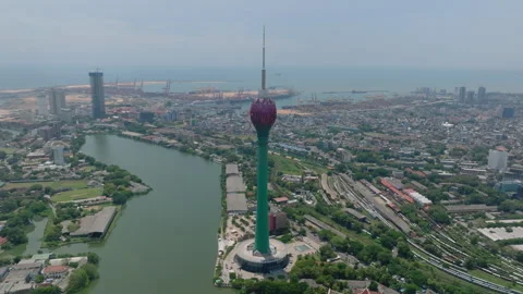 Aerial view of tall TV tower above urban... | Stock Video | Pond5