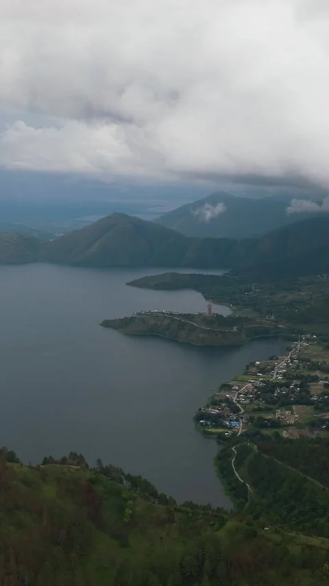 Aerial view of Toba lake and Samosir isl... | Stock Video | Pond5