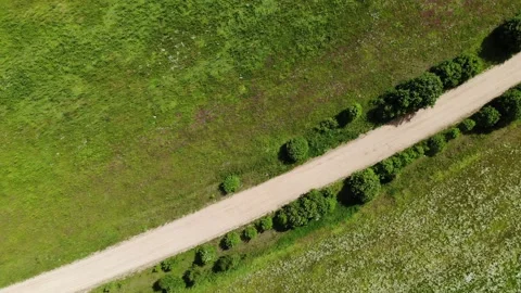 Aerial view from top down. gravel road i... | Stock Video | Pond5