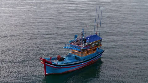 Aerial view, top view of fishing boat an... | Stock Video | Pond5