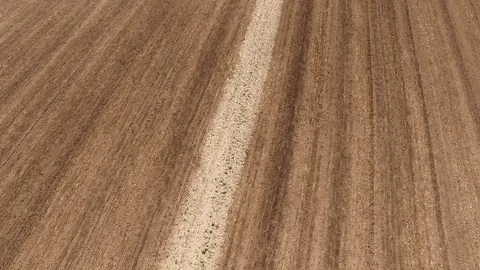Aerial view of tractor cultivating soybe... | Stock Video | Pond5