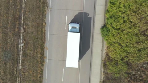 Aerial view of truck with trailer drivin... | Stock Video | Pond5