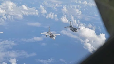 Aerial view of U.S. Air Force F-16 flyin... | Stock Video | Pond5