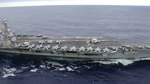 Aerial view of USS Gerald R. Ford sailin... | Stock Video | Pond5