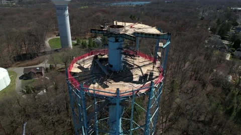 An aerial view of a water tower in the p... | Stock Video | Pond5