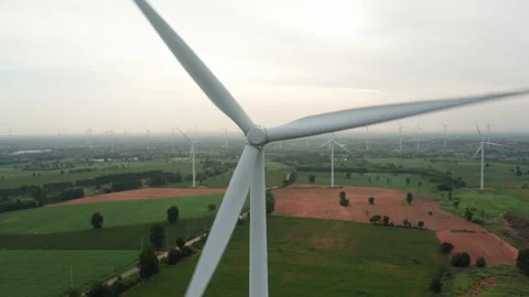 Aerial view of Wind turbines to save ene... | Stock Video | Pond5