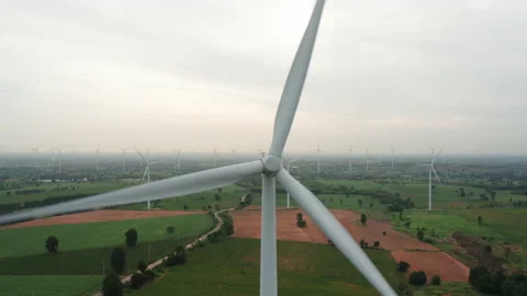 Aerial view of Wind turbines to save ene... | Stock Video | Pond5