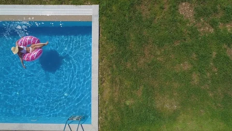 Young Woman Lying On Pool Raft Stock Videos – Royalty-Free HD & 4K ...