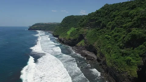 Aerial, zoom in, green cliffs of El Salv... | Stock Video | Pond5