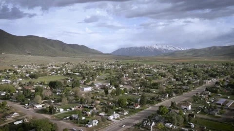 Aerial Zoom view of snowy mountain over ... | Stock Video | Pond5