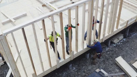 Aerial zooming out view of builders movi... | Stock Video | Pond5