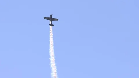 Aerobatic display: airplane various mane... | Stock Video | Pond5
