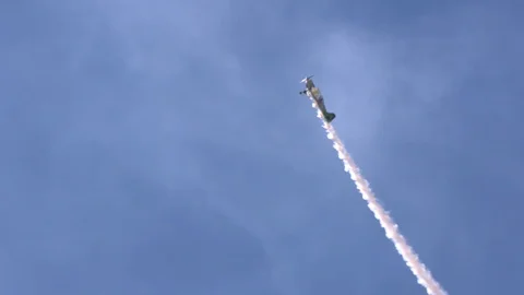 Aerobatic display: airplane various mane... | Stock Video | Pond5