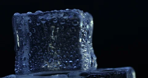 Aesthetic Ice Cubes on Black Background | Stock Video | Pond5