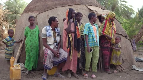 Afar tribe people in front of their trad... | Stock Video | Pond5