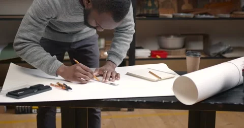 African american artchitect do draft in ... | Stock Video | Pond5