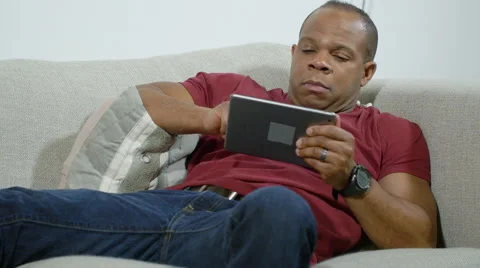 African American Baby Boomer Male on Tab... | Stock Video | Pond5
