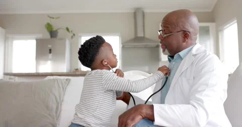 African american boy patient using steth... | Stock Video | Pond5