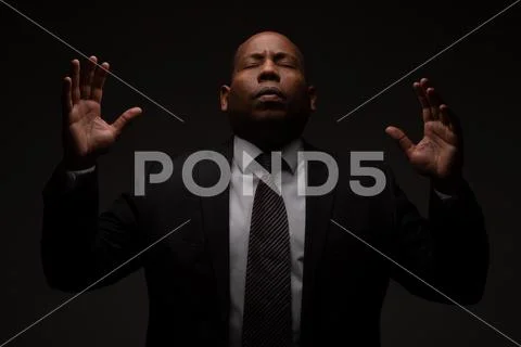 Photograph: African American Christian Man Praying and Seeking Guidance ...