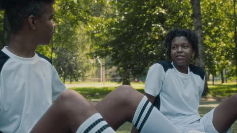 African American Gen Z Boys Sitting and ... | Stock Video | Pond5