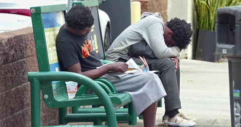 African-American homeless men sitting on... | Stock Video | Pond5