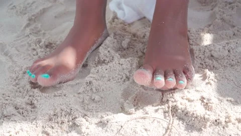 African American teen girl toes in sand ... | Stock Video | Pond5