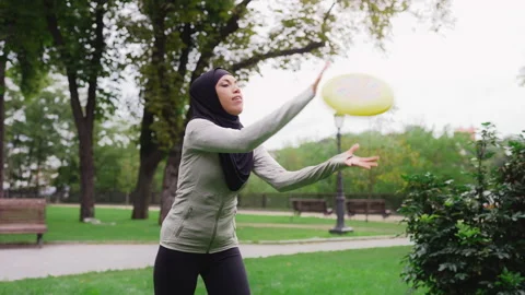 African American woman in hijab throwing... | Stock Video | Pond5