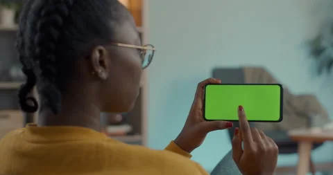 African american woman scrolling and tap... | Stock Video | Pond5