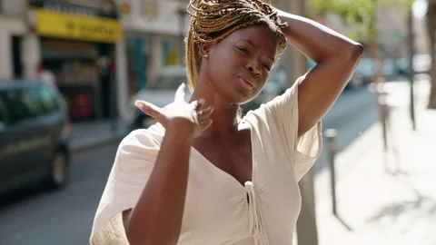 African american woman sweating at stree... | Stock Video | Pond5