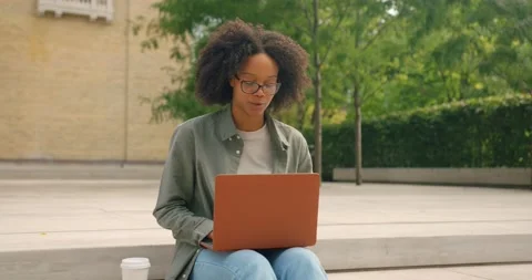 African American young female, seating o... | Stock Video | Pond5