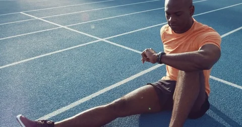 African Checking Time Stock Footage ~ Royalty Free Stock Videos | Pond5