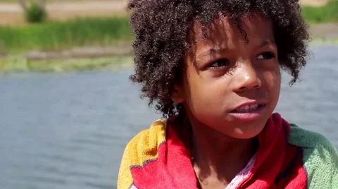 African boy shivering with cold. Intense... | Stock Video | Pond5