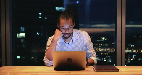 African businessman stay late in modern ... | Stock Video | Pond5