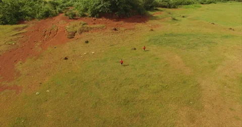African children run to hide under the t... | Stock Video | Pond5