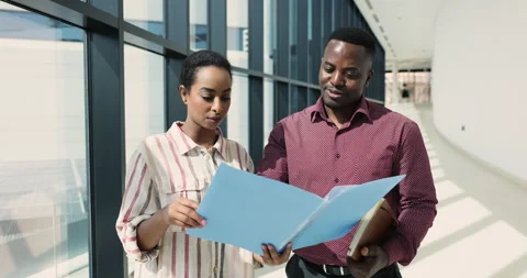 African coworkers, colleagues lead talk ... | Stock Video | Pond5