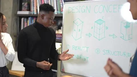 African creative man talking to creative... | Stock Video | Pond5