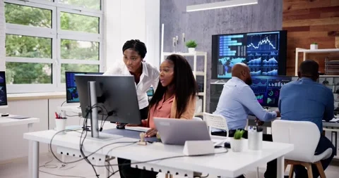 African Financial Data Analysts Using Da... | Stock Video | Pond5