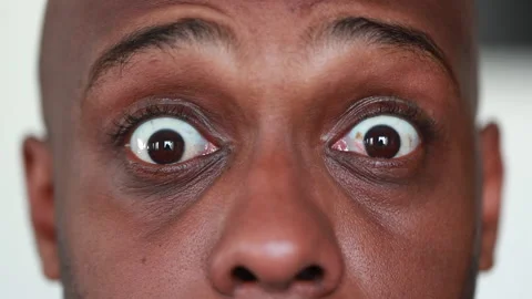 African man SHOCK reaction, Close-up bla... | Stock Video | Pond5