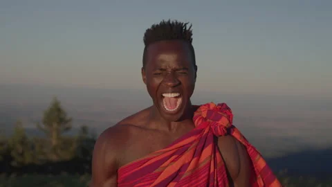 African Man Shouting From A Mountaintop | Stock Video | Pond5