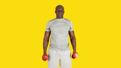 African man standing doing curl bicep ex... | Stock Video | Pond5