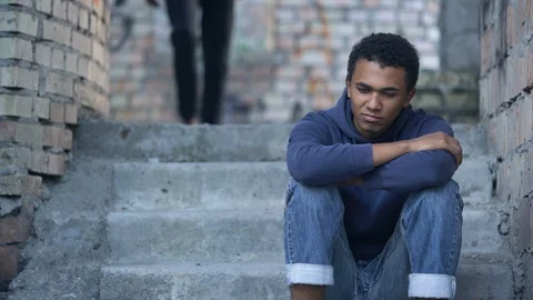 African student hugging sad friend sitti... | Stock Video | Pond5