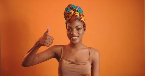 African woman shows class with one hand.... | Stock Video | Pond5