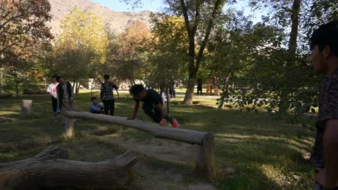 Agile and acrobatic boy training Parkour... | Stock Video | Pond5