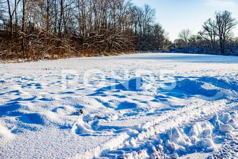 Agricultural plot covered by thick layer of snow after heavy snowfall ...