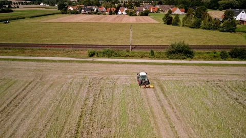 Agricultural work cutting hay - old trac... | Stock Video | Pond5