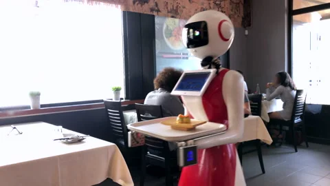 AI Robot waiter or waitress serves food ... | Stock Video | Pond5